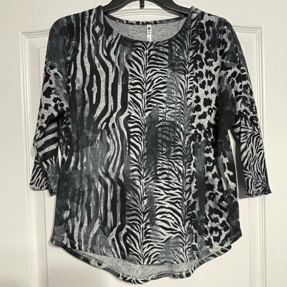 Leo & Nicole | Tops | Leo Nicole Ps Animal Print Blouse | Poshmark